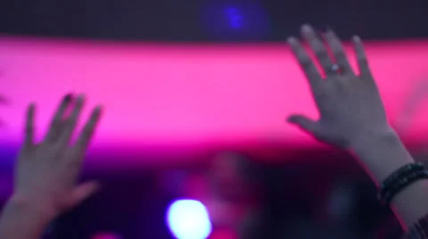 Two hands waving in ecstasy on dance flo... | Stock Video | Pond5
