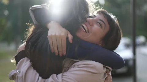 Two happy female best friends hugging ea... | Stock Video | Pond5