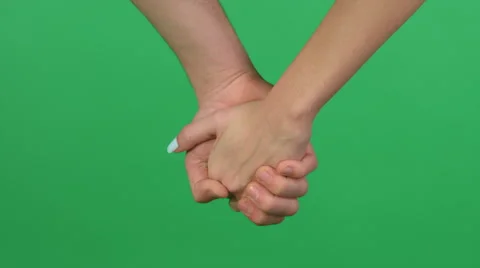 Two holding hands on green screen backgr... | Stock Video | Pond5
