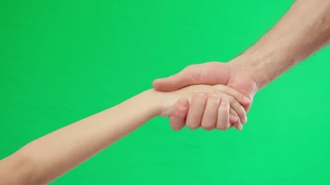 Two holding hands on green screen backgr... | Stock Video | Pond5