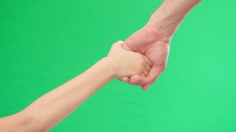 Two holding hands on green screen backgr... | Stock Video | Pond5