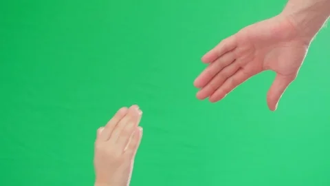 Two holding hands on green screen backgr... | Stock Video | Pond5
