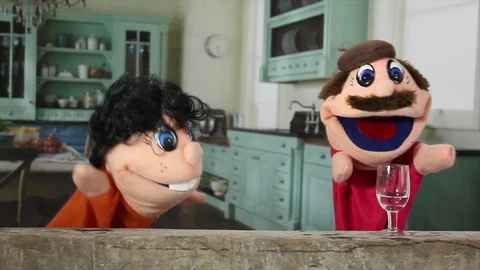 Two human like hand puppets breaking gla... | Stock Video | Pond5