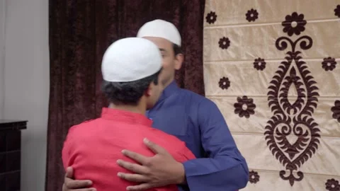 Two Indian muslim men hugging and celebr... | Stock Video | Pond5