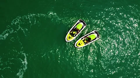 Two jet skis stand next to each other in... | Stock Video | Pond5