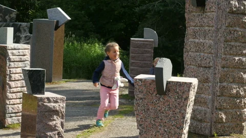 Two kids are playing catch-up, kids runn... | Stock Video | Pond5