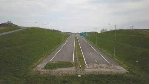 Two-lane motorway with empty road signs.... | Stock Video | Pond5