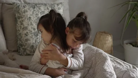 Two Little Baby Sisters Hugging Each Oth... | Stock Video | Pond5