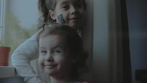 Two little girls with computer component... | Stock Video | Pond5