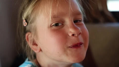 Two little girls licking their lips and ... | Stock Video | Pond5