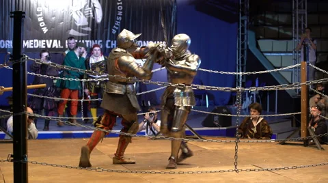 Two medieval knight fighting in the aren... | Stock Video | Pond5