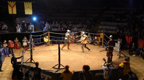 Two medieval knight fighting in the aren... | Stock Video | Pond5