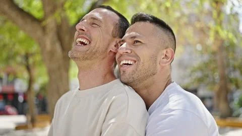 Two men couple smiling confident standin... | Stock Video | Pond5