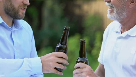 Two men drinking beer, long lasting brew... | Stock Video | Pond5