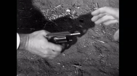 Two men fighting over gun on the ground | Stock Video | Pond5