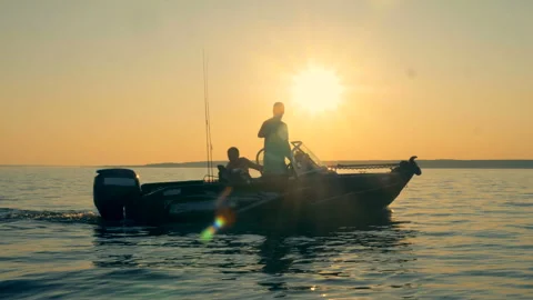 Two men on a fishing boat, side view. | Stock Video | Pond5