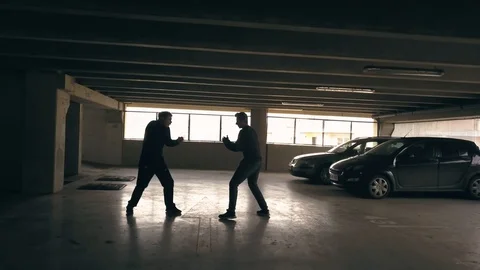 Two men prepare for an action scene in a... | Stock Video | Pond5