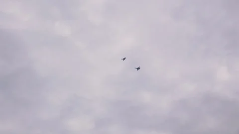 two military planes fly together in the ... | Stock Video | Pond5
