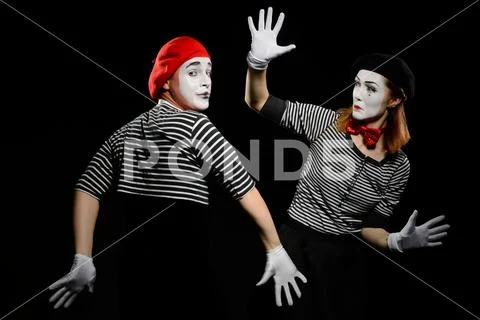 Two mimes and invisible wall. Pantomime show at circus ~ Hi Res #124393283