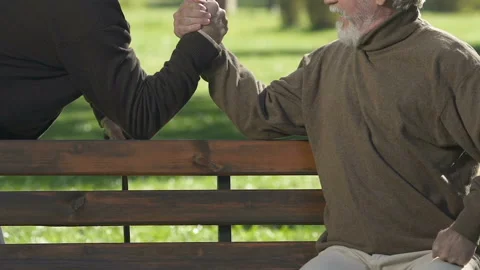 Two old men competing in arm wrestling i... | Stock Video | Pond5