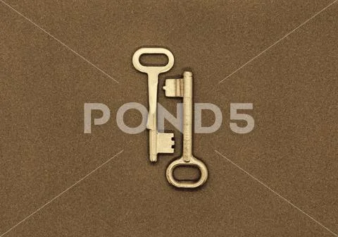 Two old metal keys on paper background ~ Premium Photo #105869819