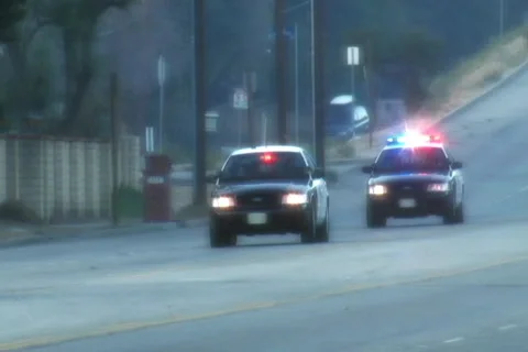 Two Police Cars Enroute | Stock Video | Pond5