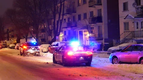 Two police cars in front of apartment bu... | Stock Video | Pond5