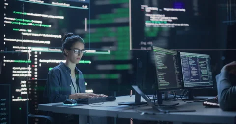 Two Programmers Writing Code Surrounded ... | Stock Video | Pond5