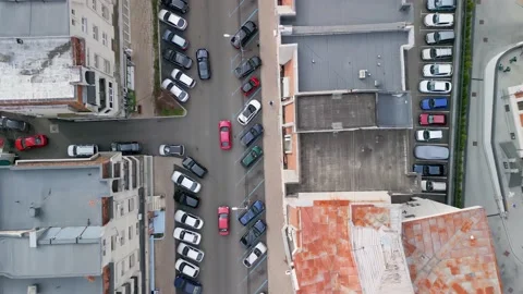 Two Red Cars Running on a Little Street ... | Stock Video | Pond5