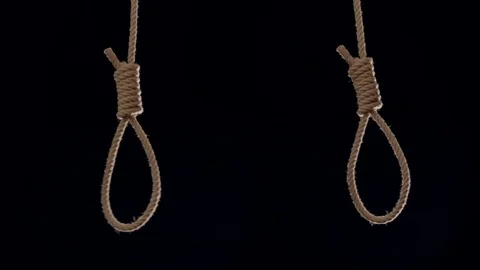 Two rope nooses swing adjacent to each o... | Stock Video | Pond5