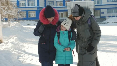 Two Schoolgirls friends pick up their li... | Stock Video | Pond5