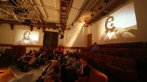 Two screens at walls of auditorium where... | Stock Video | Pond5