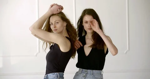 Two slender girls, one blonde, the other... | Stock Video | Pond5