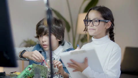 Two smart children doing school project ... | Stock Video | Pond5
