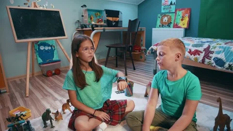 Two smart children using smartwatch inte... | Stock Video | Pond5