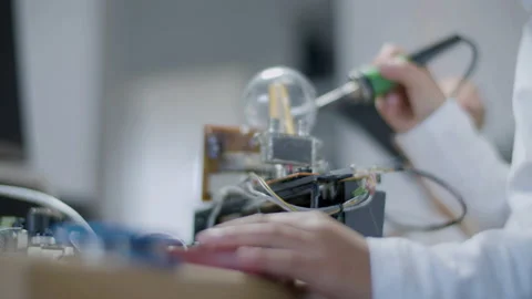 Two smart kids doing school project in e... | Stock Video | Pond5
