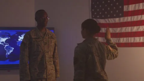 Two Soldiers Standing in Front of the Fl... | Stock Video | Pond5