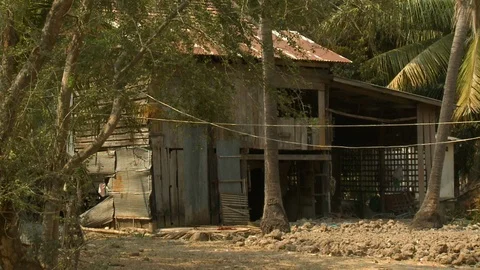 Two-story wooden house beside a road and... | Stock Video | Pond5
