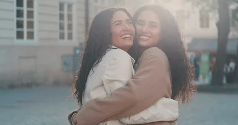 Two Stylish Sisters Standing in front of... | Stock Video | Pond5