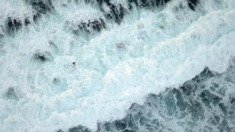 Two Surfers getting hit by a Wave in Bal... | Stock Video | Pond5