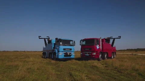 Two tow trucks, car tow trucks, aerial p... | Stock Video | Pond5