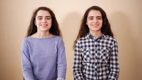 Two twins sisters teenage cute girls wit... | Stock Video | Pond5