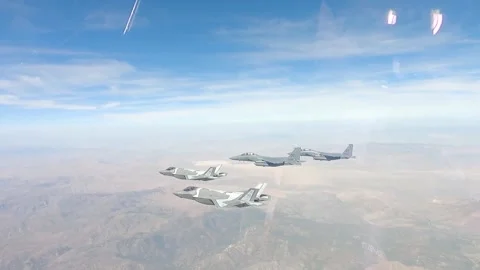 Two USAF F-35A Lightning II and F-15 Str... | Stock Video | Pond5