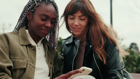 Two Women Best Friends or Couple Using a... | Stock Video | Pond5