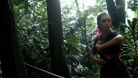 Two women fighting each other with tradi... | Stock Video | Pond5