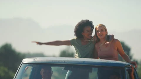 Two Women Standing In Back Of Pick Up Tr... | Stock Video | Pond5