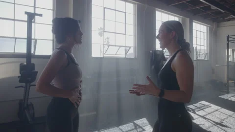 Two Women Talking with Each Other in a W... | Stock Video | Pond5