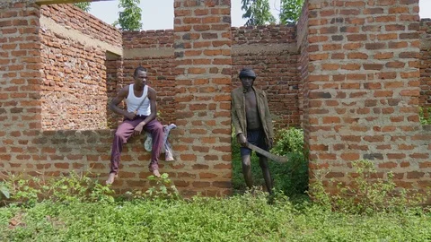 Two young African gangsters with weapons... | Stock Video | Pond5