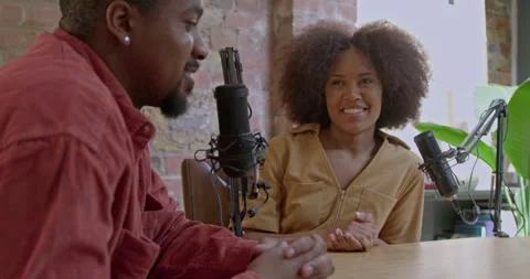 Two Young Creative People Talking on Pod... | Stock Video | Pond5