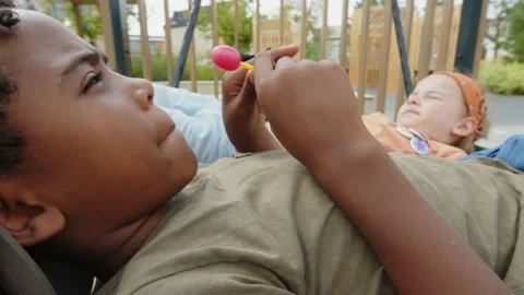 Two Young Diverse Friends Chilling out o... | Stock Video | Pond5